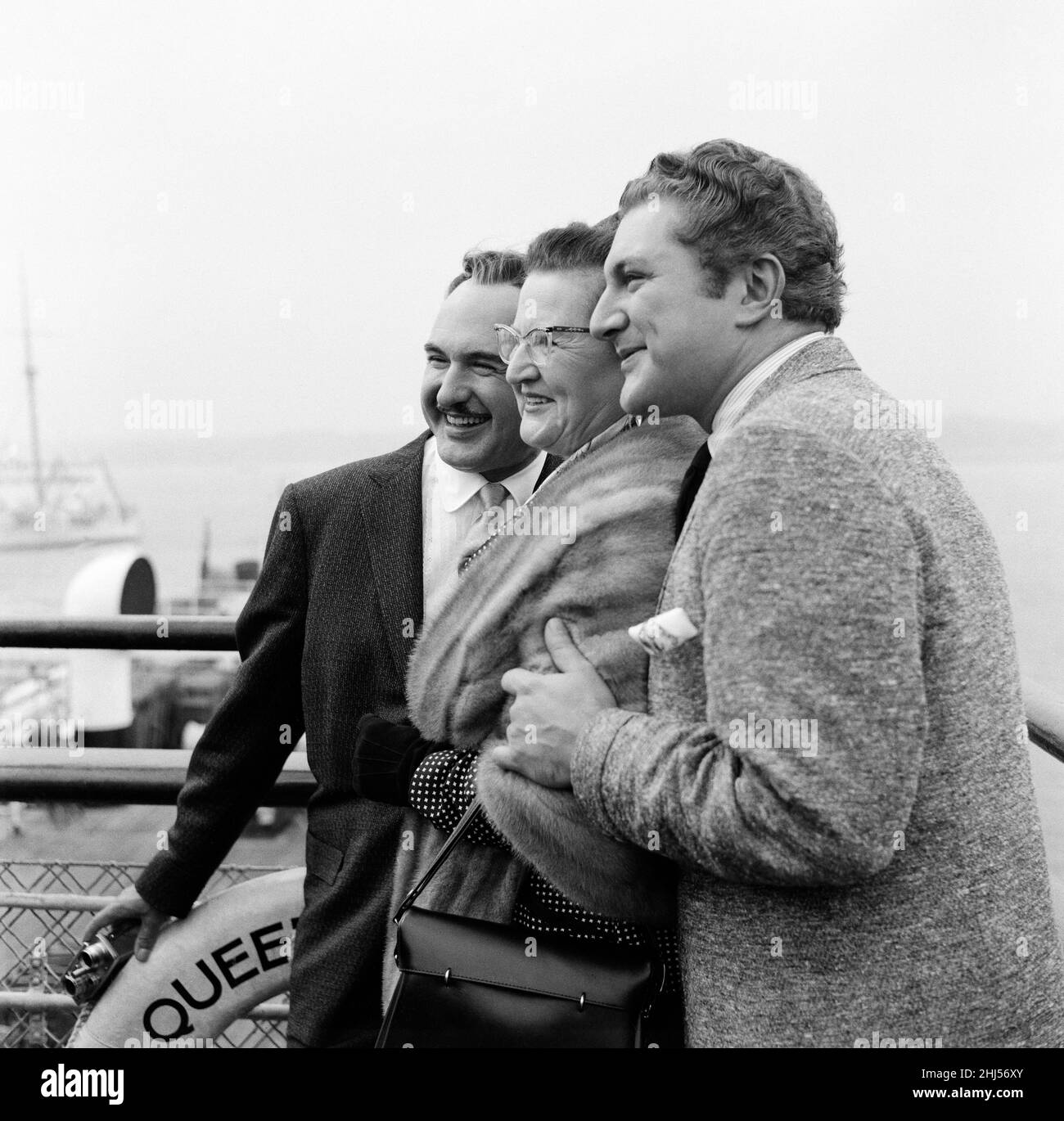 Liberace (right) with his brother George and his mother, during his ...