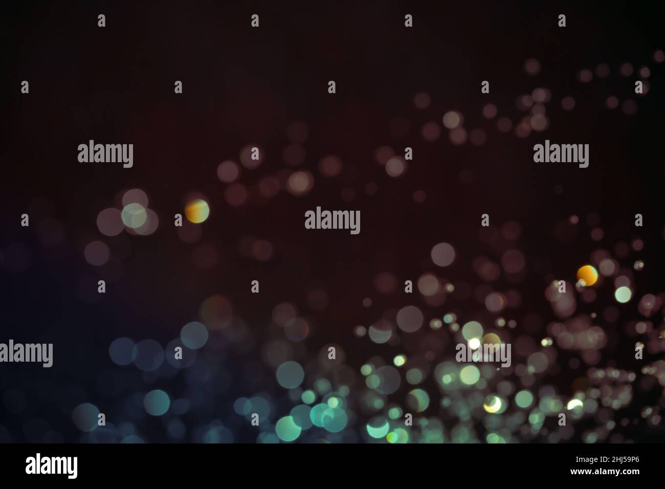 Abstract bokeh texture on black background Stock Photo - Alamy