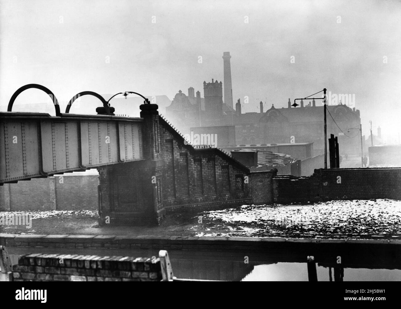 A canal bridge, Bootle Hospital in the background. January 1958 Stock ...