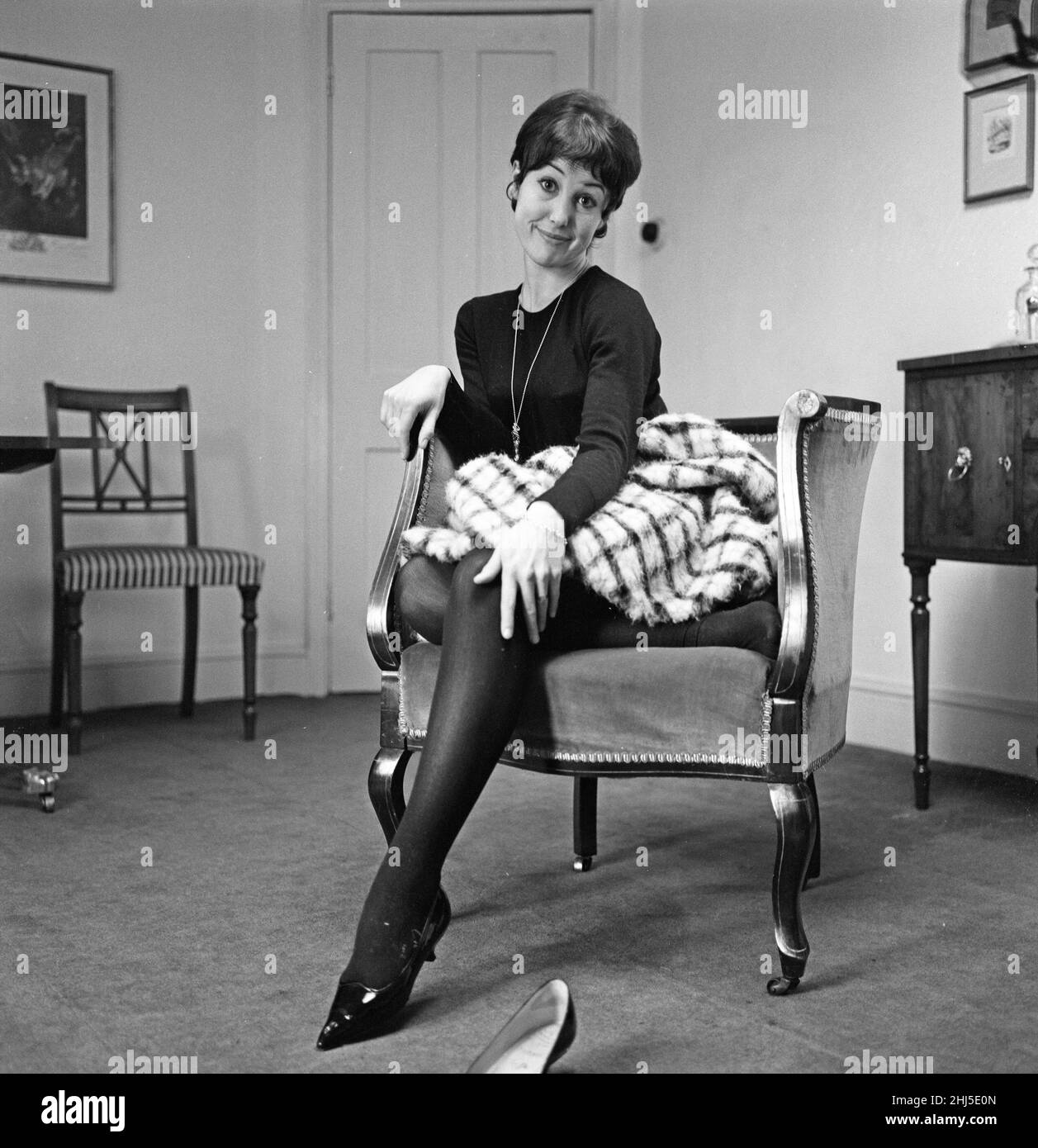 Dancer Una Stubbs, aged 22, in her flat in London. 4th December 1959 ...