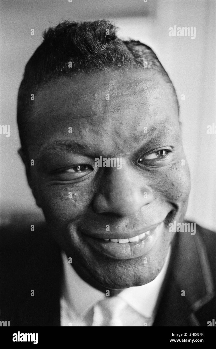 Nat King Cole, American singer, and pianist performing in London. He ...