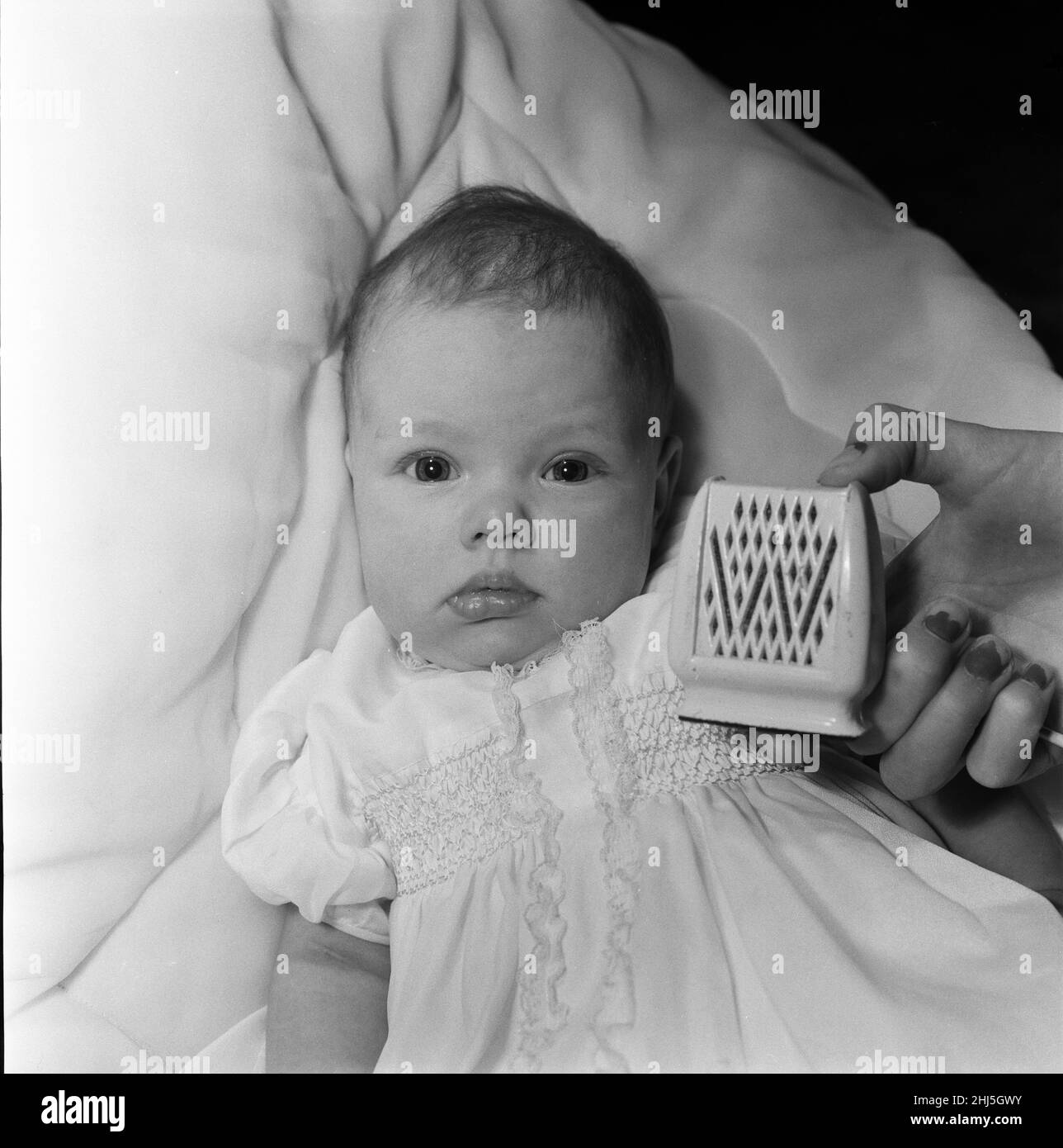 Baby Kim Wilde at home in Chiswick with a microphone. 30th January 1961 ...