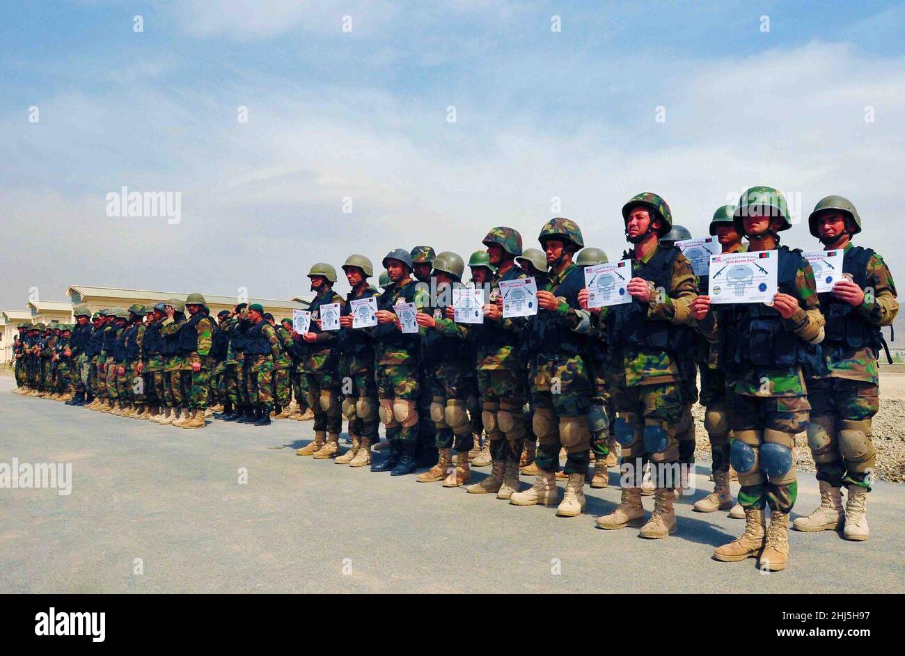 Students of the Quick Reaction Force and Security course hold up their ...