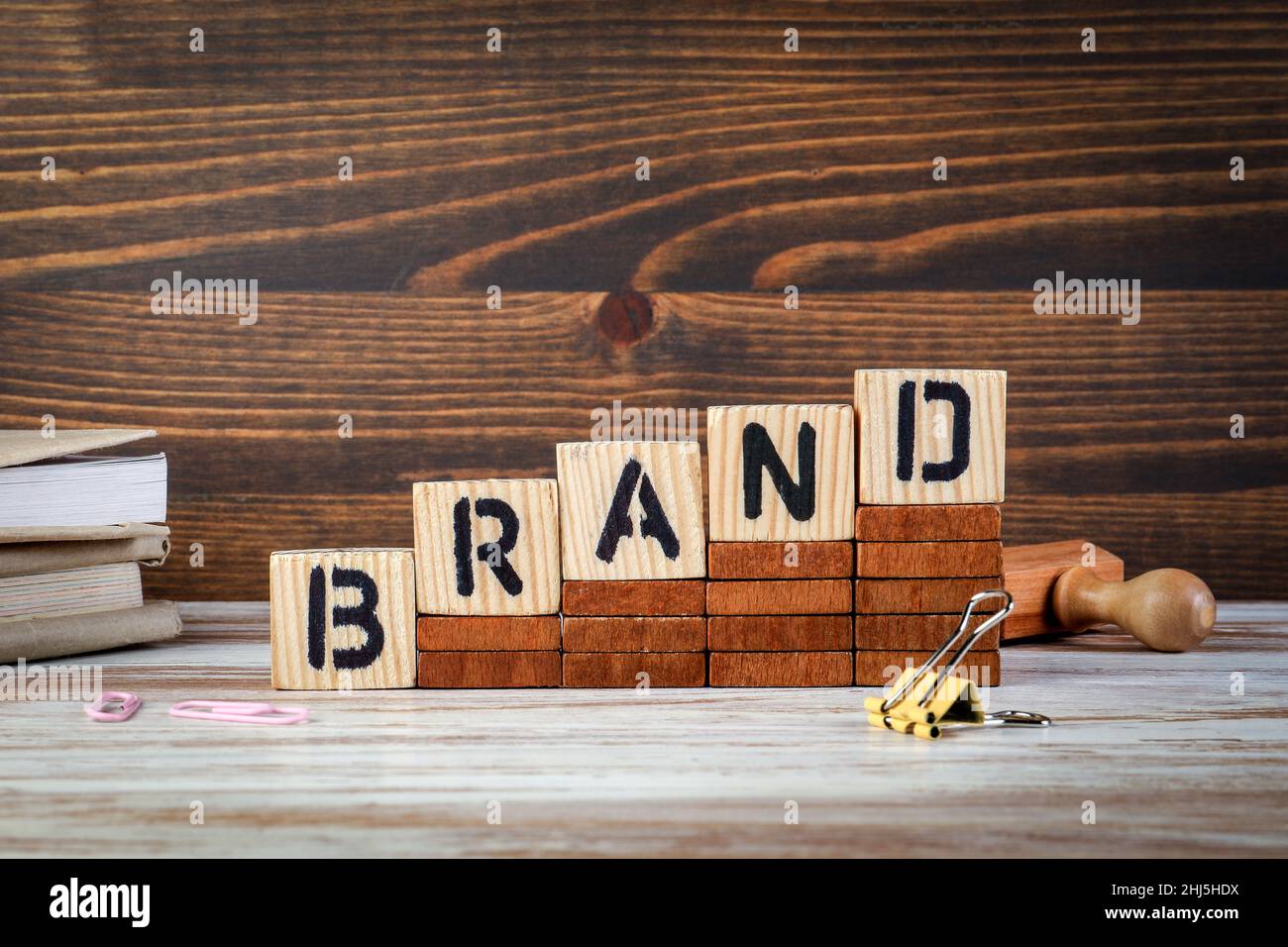 Brand. Business development concept. Wooden letters on the office desk ...