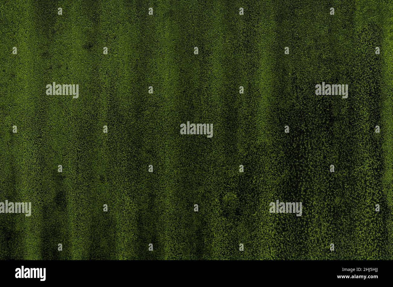 Green color rough textured wavy metal sheet for abstract background ...