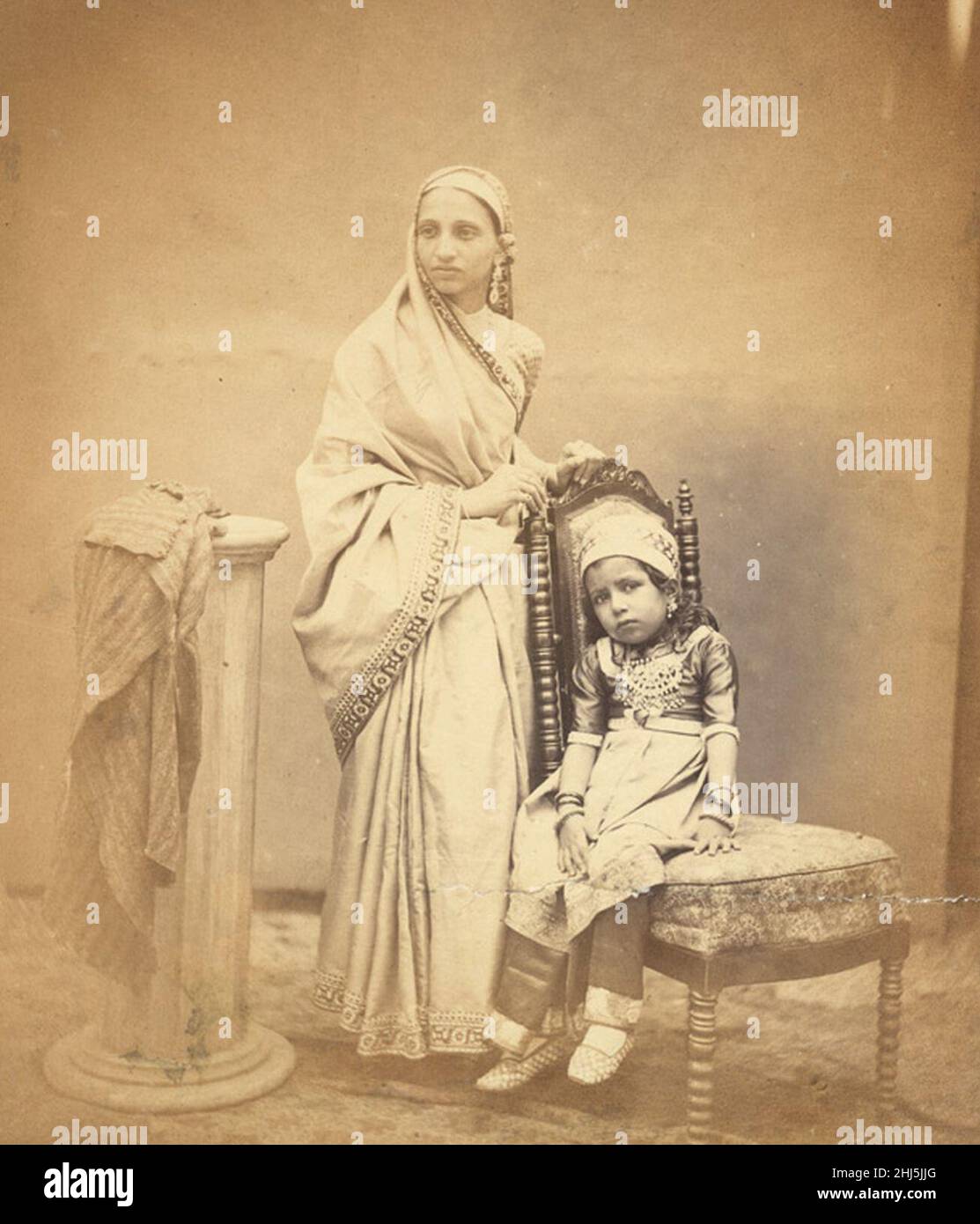Studio photograph of a Parsee lady with a child in Bombay in 1867 Stock ...
