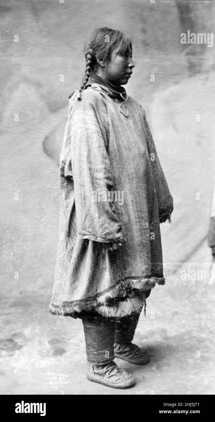Studio portrait of Eskimo woman in cloth parka with fur trim, Nome ...