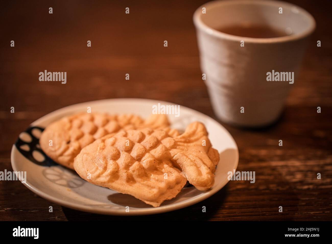 A decorated plate with 2 famous Japanese fish-shaped confections ...