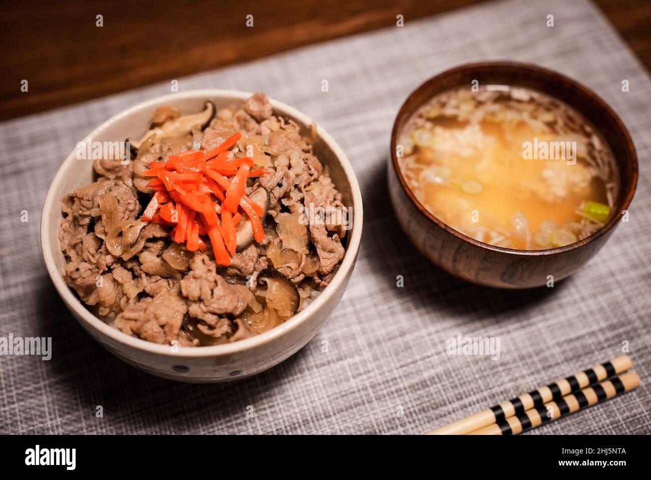 A bowl of popular Japanese food Gyudon served with pickled ginger (beef ...
