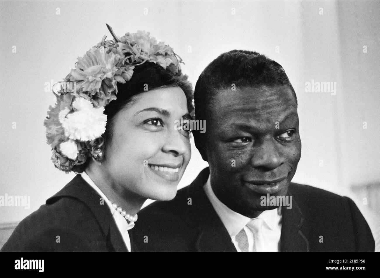 Nat King Cole, American singer, and pianist performing in London. He ...