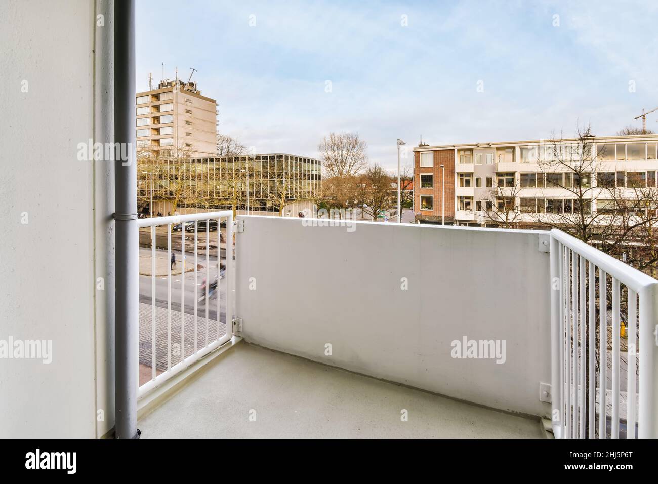 Amazing balcony design in a lovely house with a street view Stock Photo ...