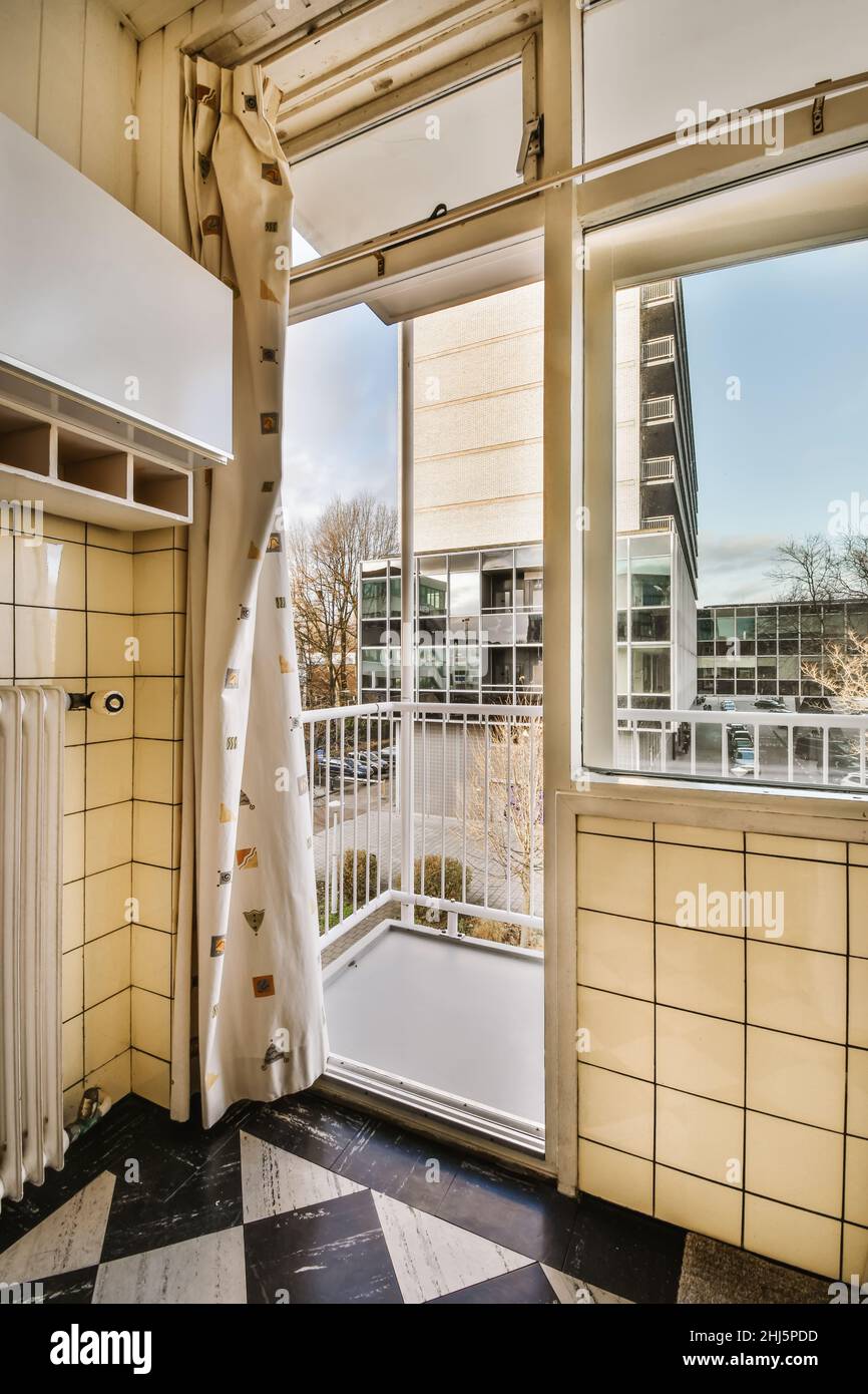 Amazing design with open doors leading to a balcony in a lovely house ...