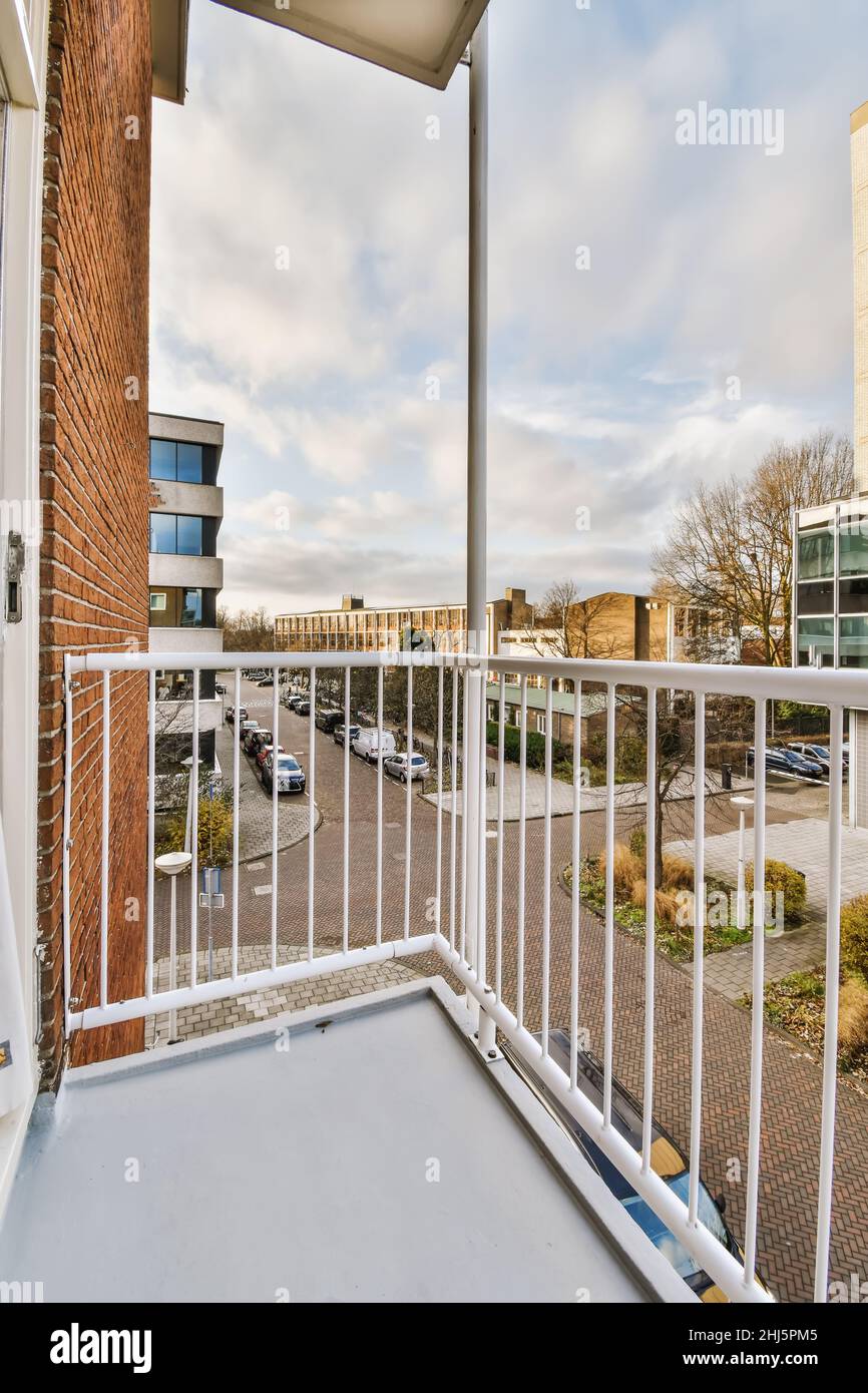Amazing balcony design in a lovely house with a street view Stock Photo ...