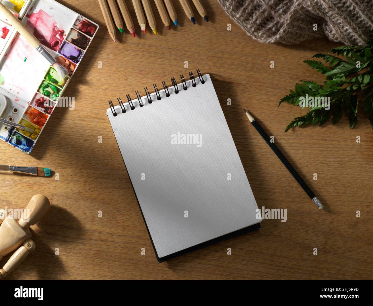 Artists, students workspace with empty spiral notepad paper mockup and ...