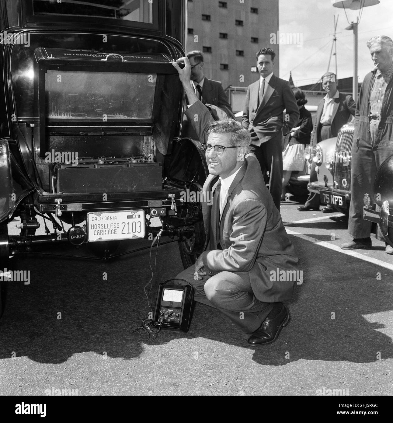 A revolutionary car driven by sun power. Dr Charles Escoffery with his ...