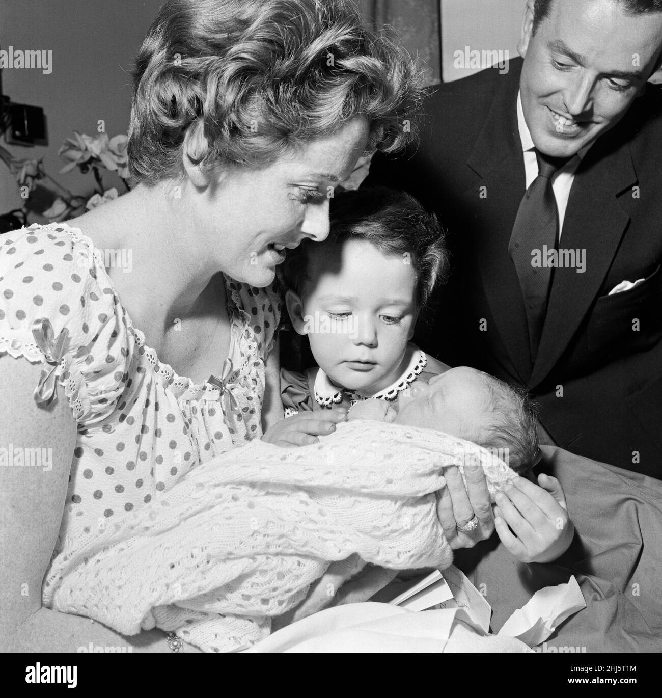 3-year-old Louisa, daughter of Brian Rix and Elspet Gray, meets her new ...