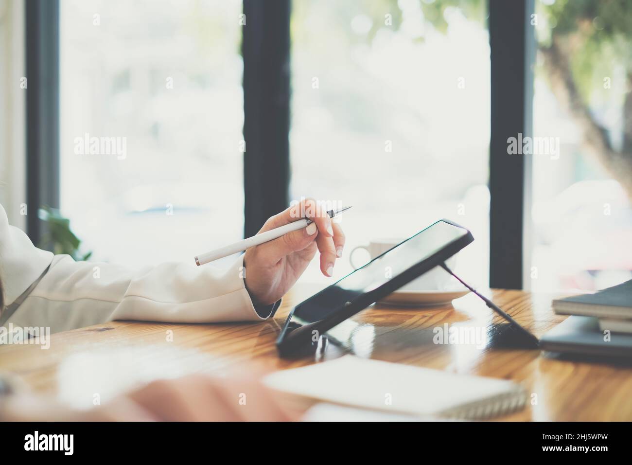 Fund managers or consultant working with digital tablet to analysis ...