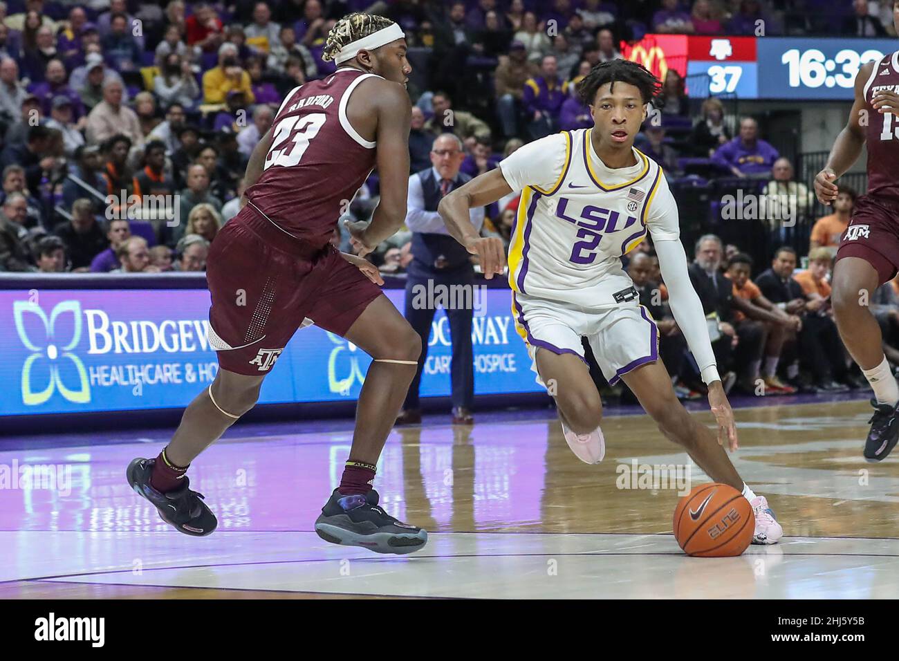 January 26, 2022: LSU's Eric Gaines (2) tries to drive the ball past ...
