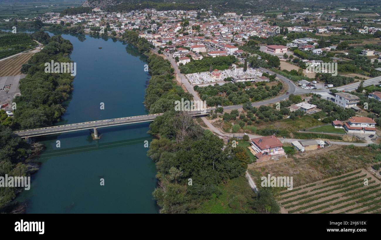Aerial drone view of river Acheloos and Katochi village at ...