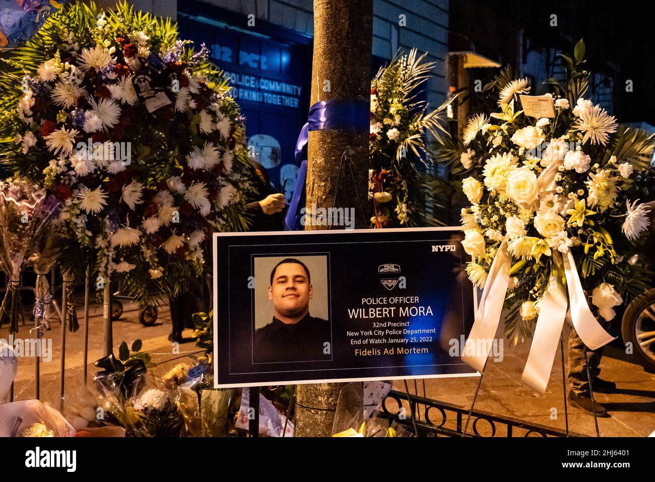 A memorial for fallen NYPD Officer Wilbert Mora has been erected ...
