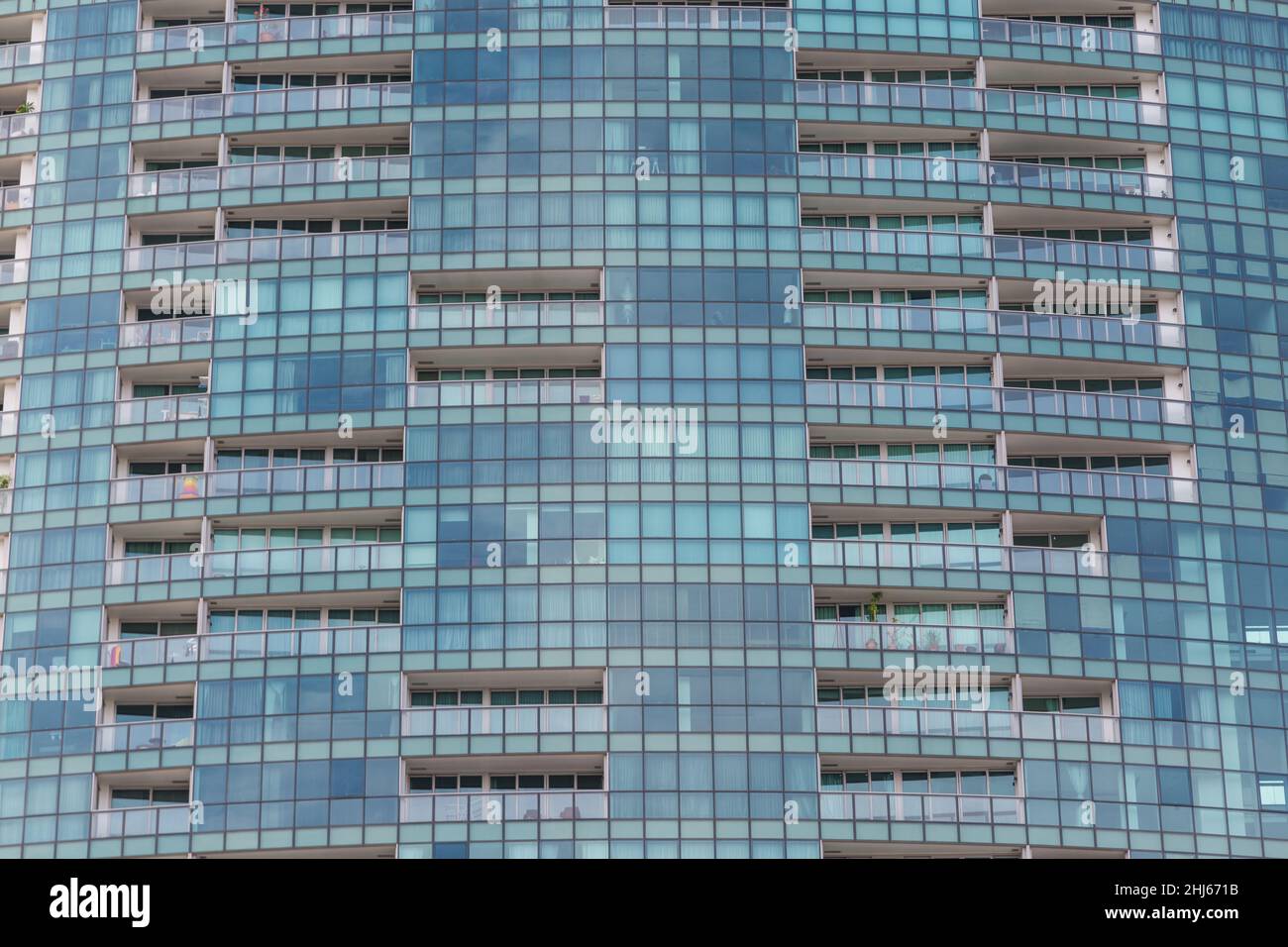 Glass windows of modern office building background Stock Photo - Alamy