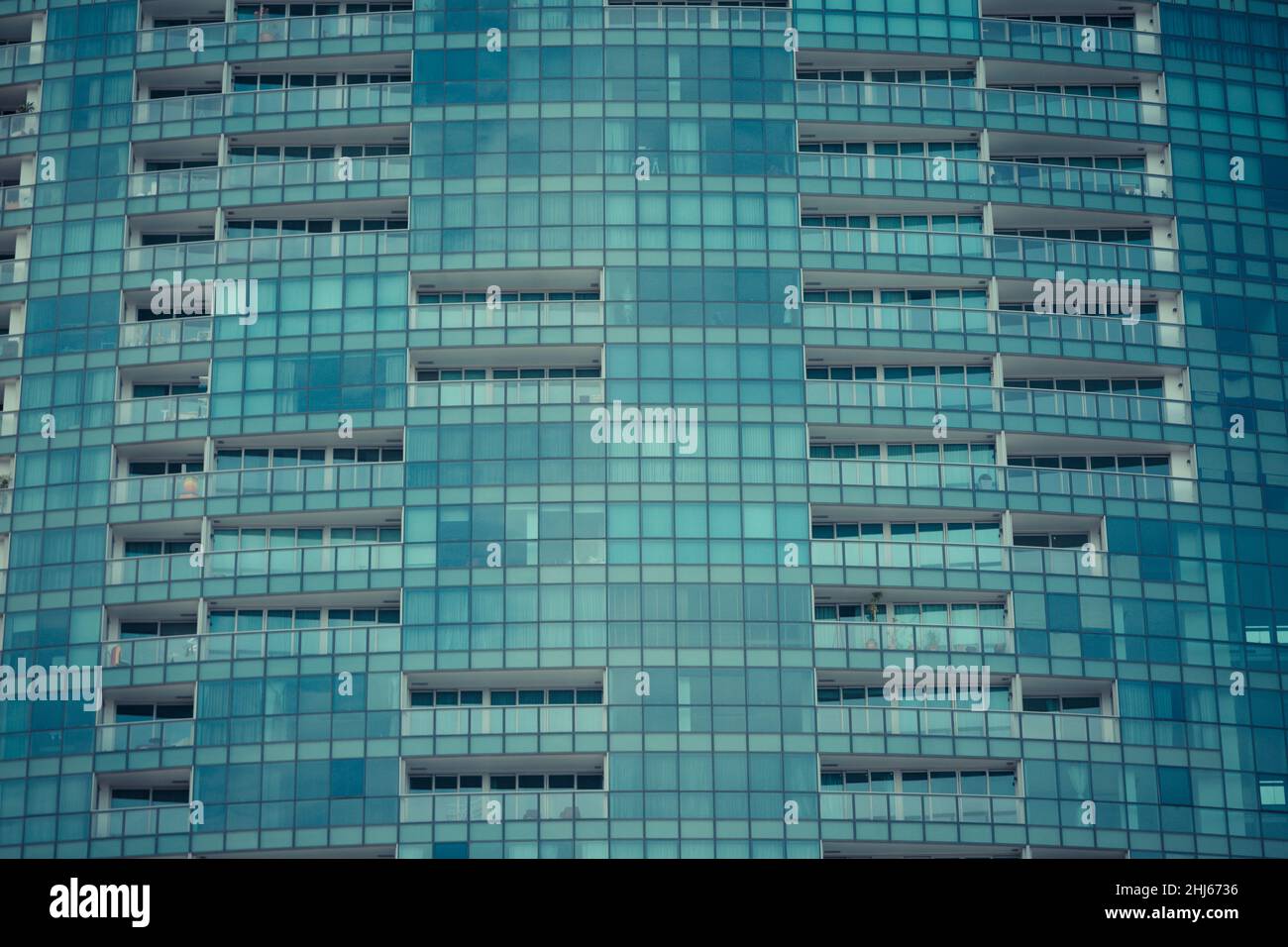 Glass windows of modern office building background Stock Photo - Alamy