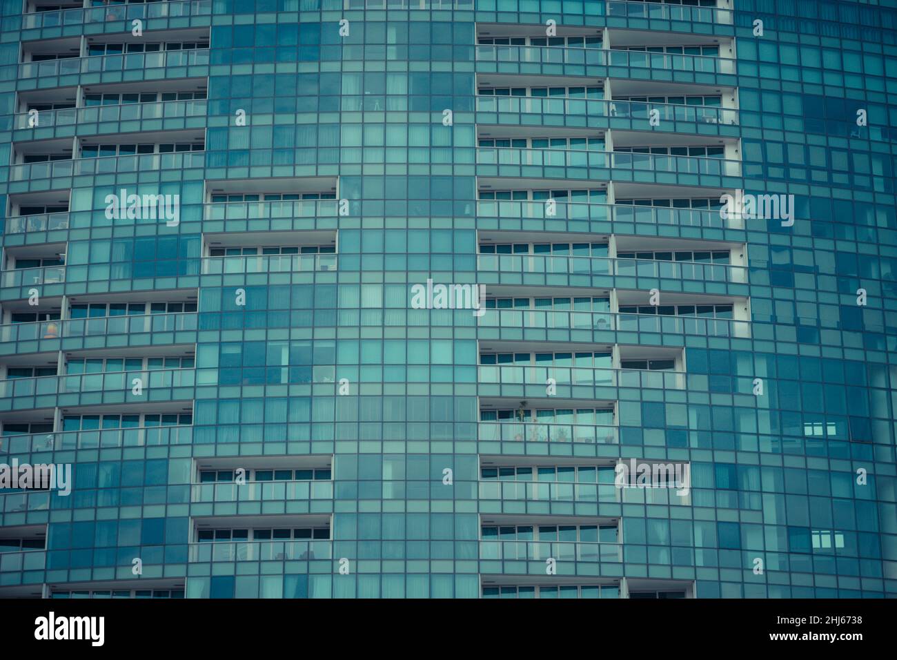 Glass windows of modern office building background Stock Photo - Alamy