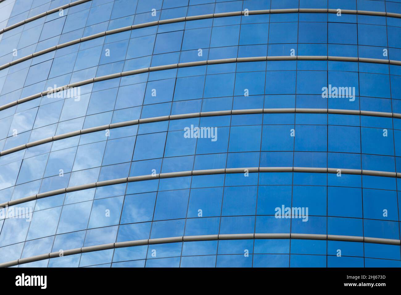 Glass windows of modern office building background Stock Photo - Alamy