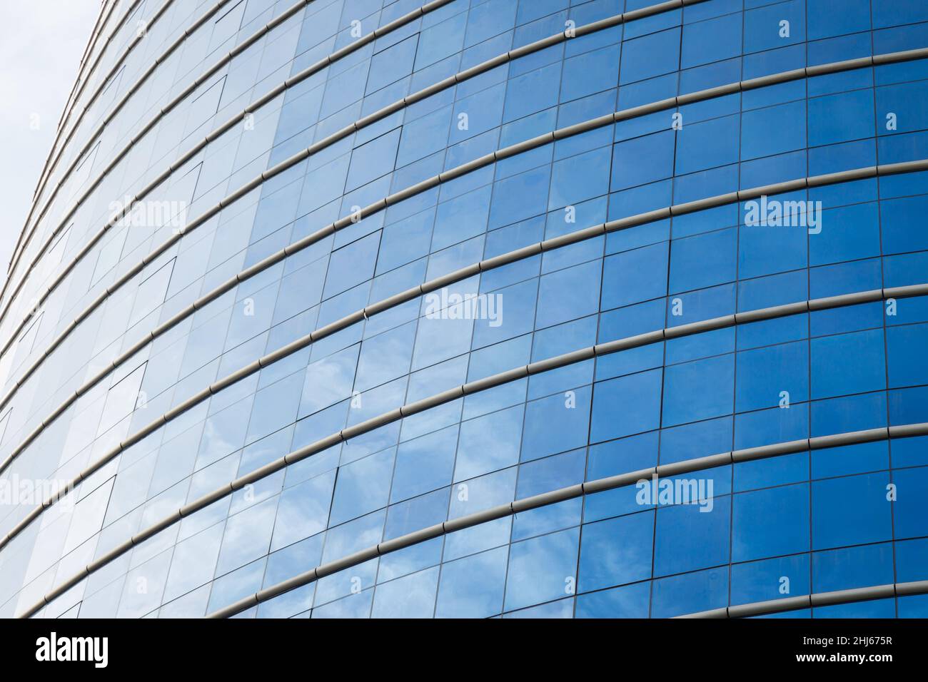 Glass windows of modern office building background Stock Photo - Alamy