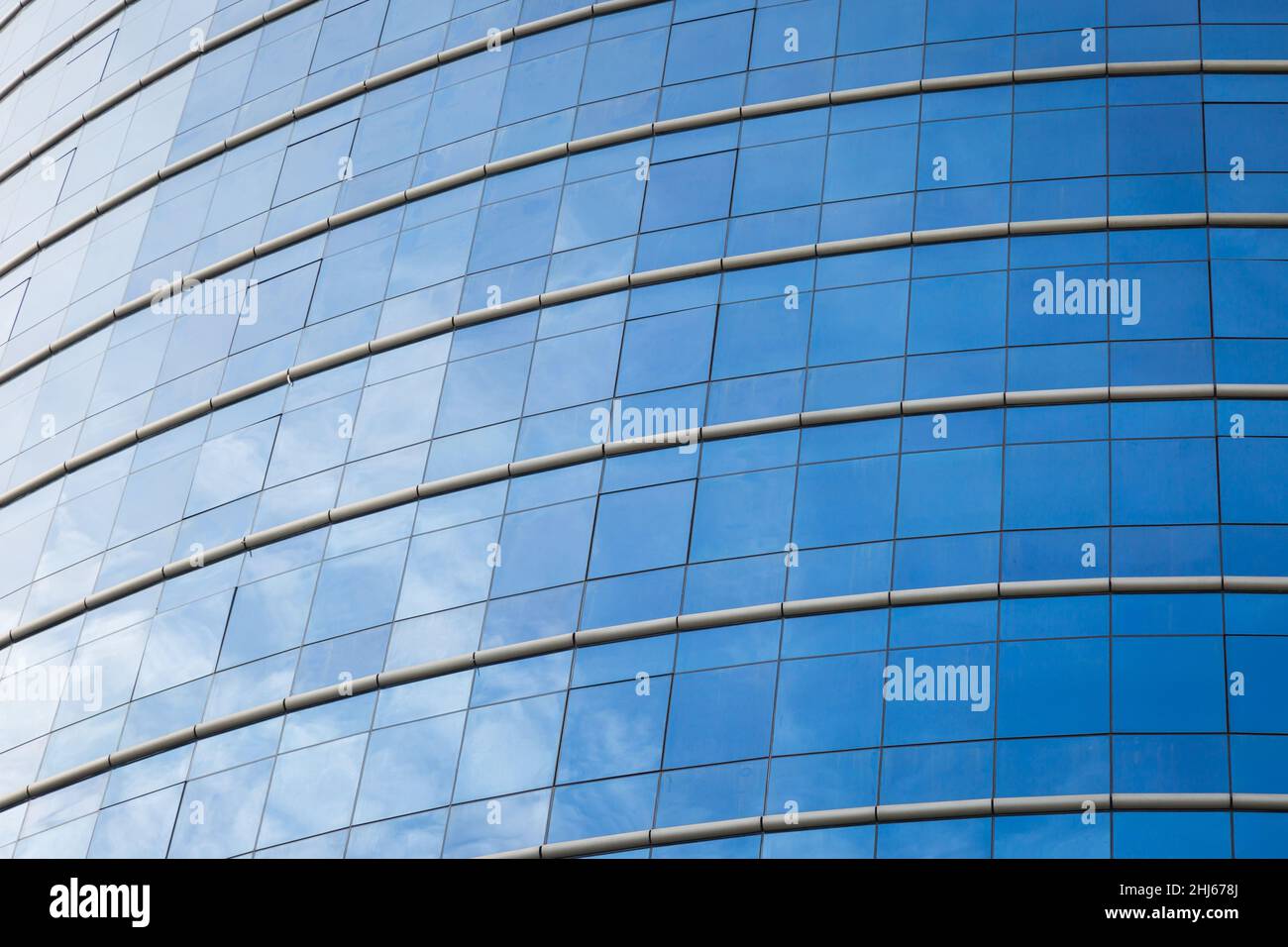 Glass windows of modern office building background Stock Photo - Alamy