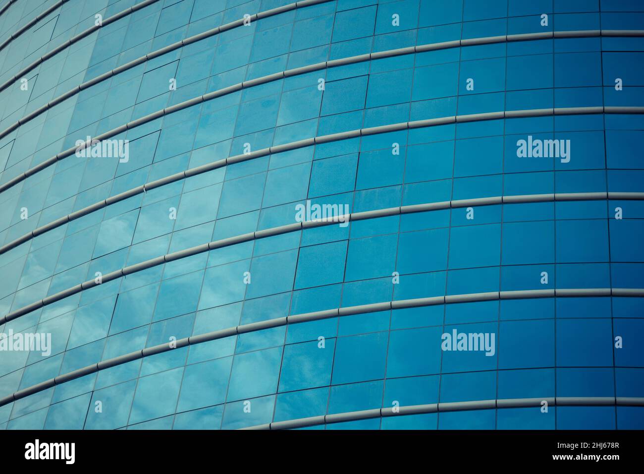 Glass windows of modern office building background Stock Photo - Alamy