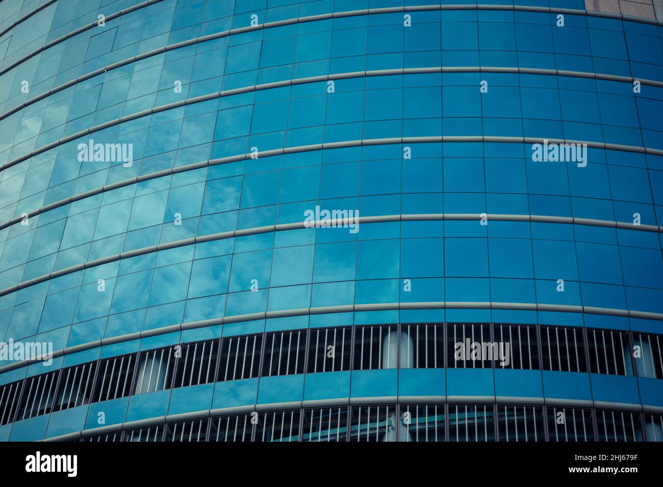 Glass windows of modern office building background Stock Photo - Alamy