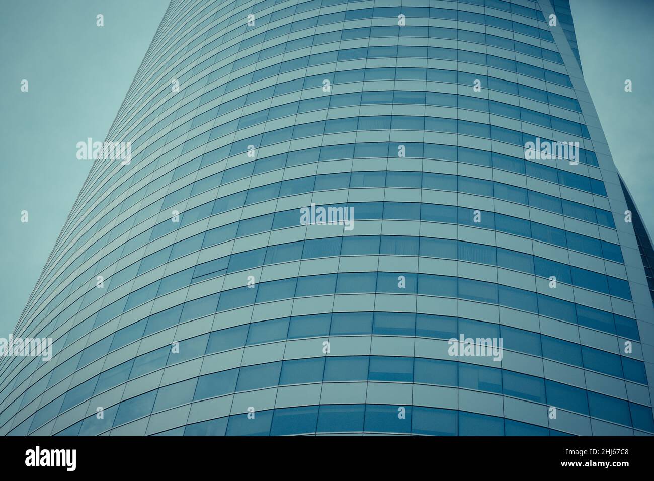 Glass windows of modern office building background Stock Photo - Alamy