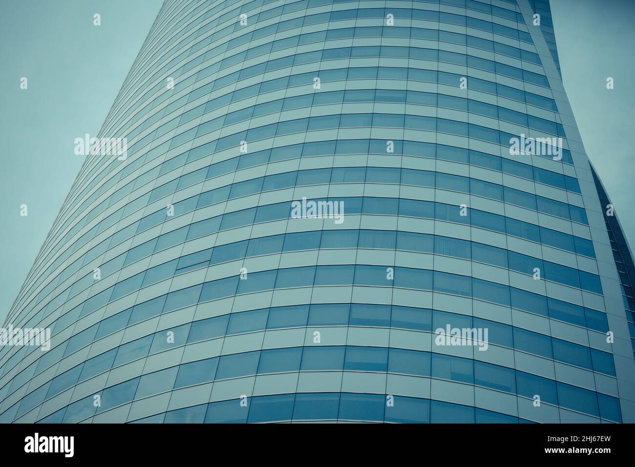 Glass windows of modern office building background Stock Photo - Alamy