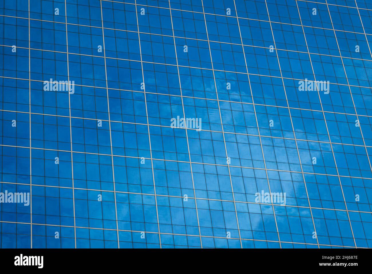 Glass windows of modern office building background Stock Photo - Alamy