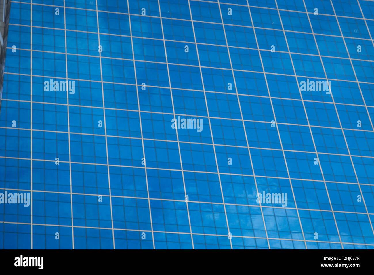 Glass windows of modern office building background Stock Photo - Alamy