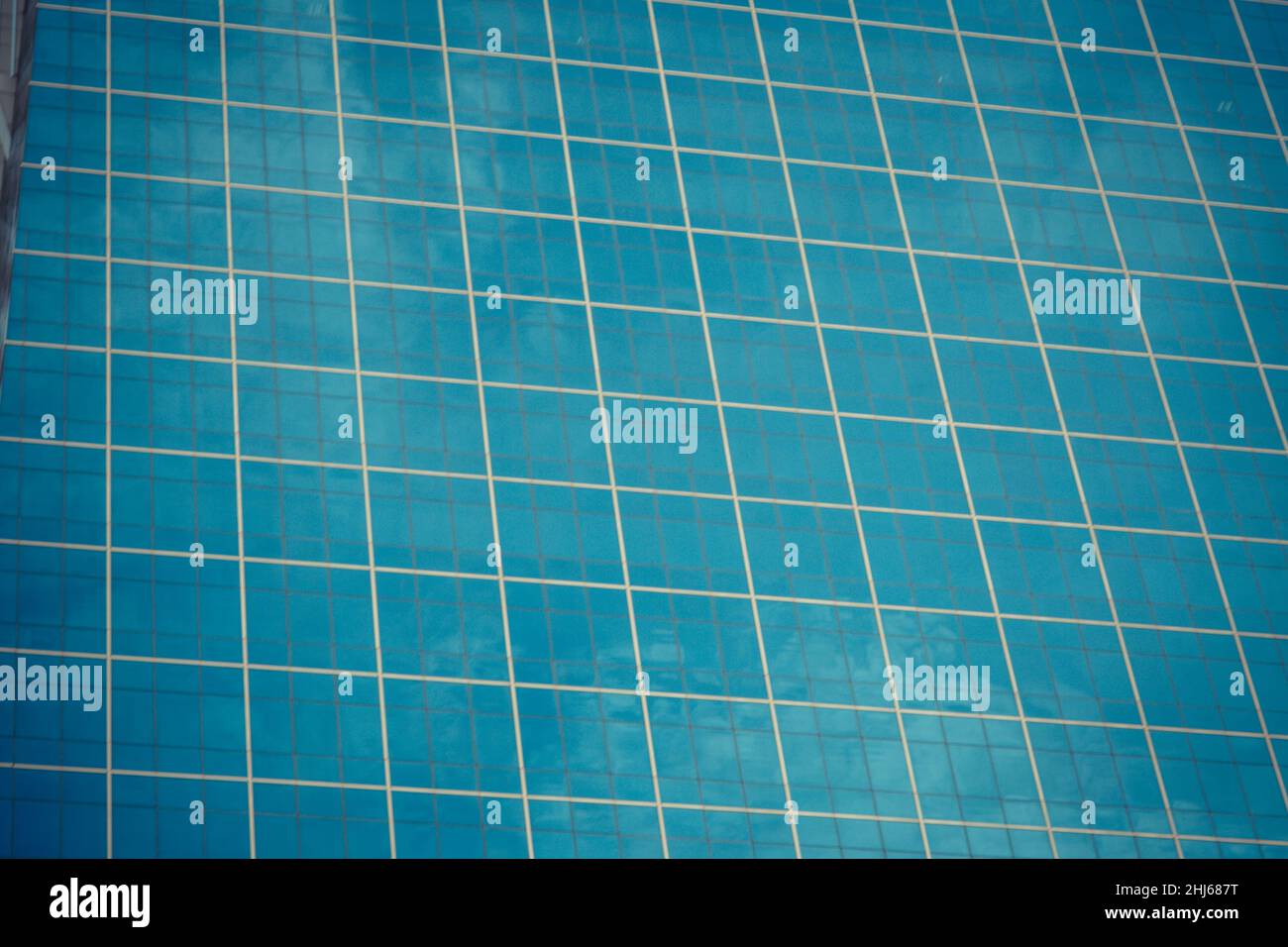 Glass windows of modern office building background Stock Photo - Alamy