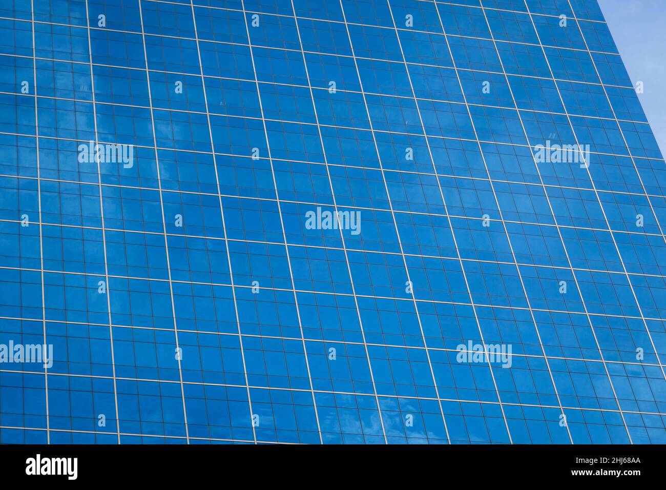 Glass windows of modern office building background Stock Photo - Alamy