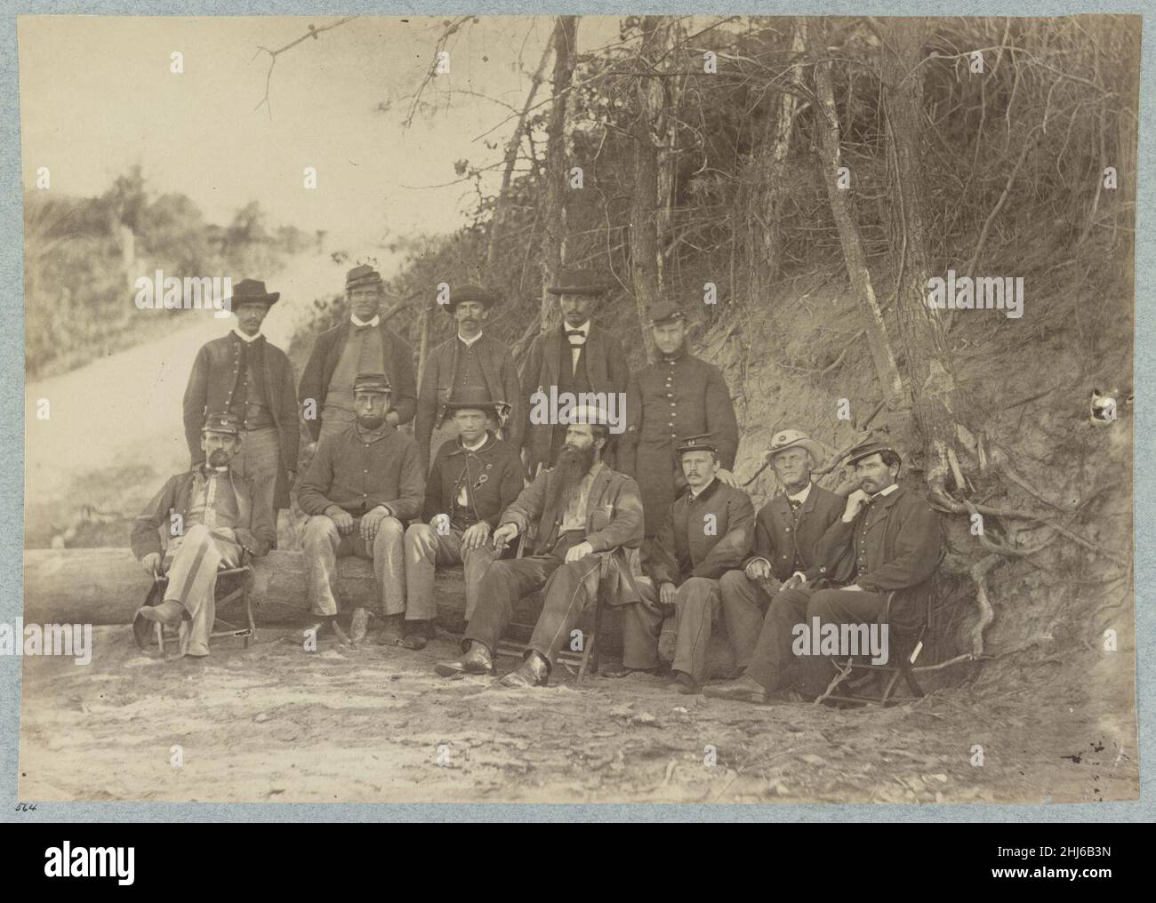 Surgeon John H. Brinton and group of hospital attendants in front of ...