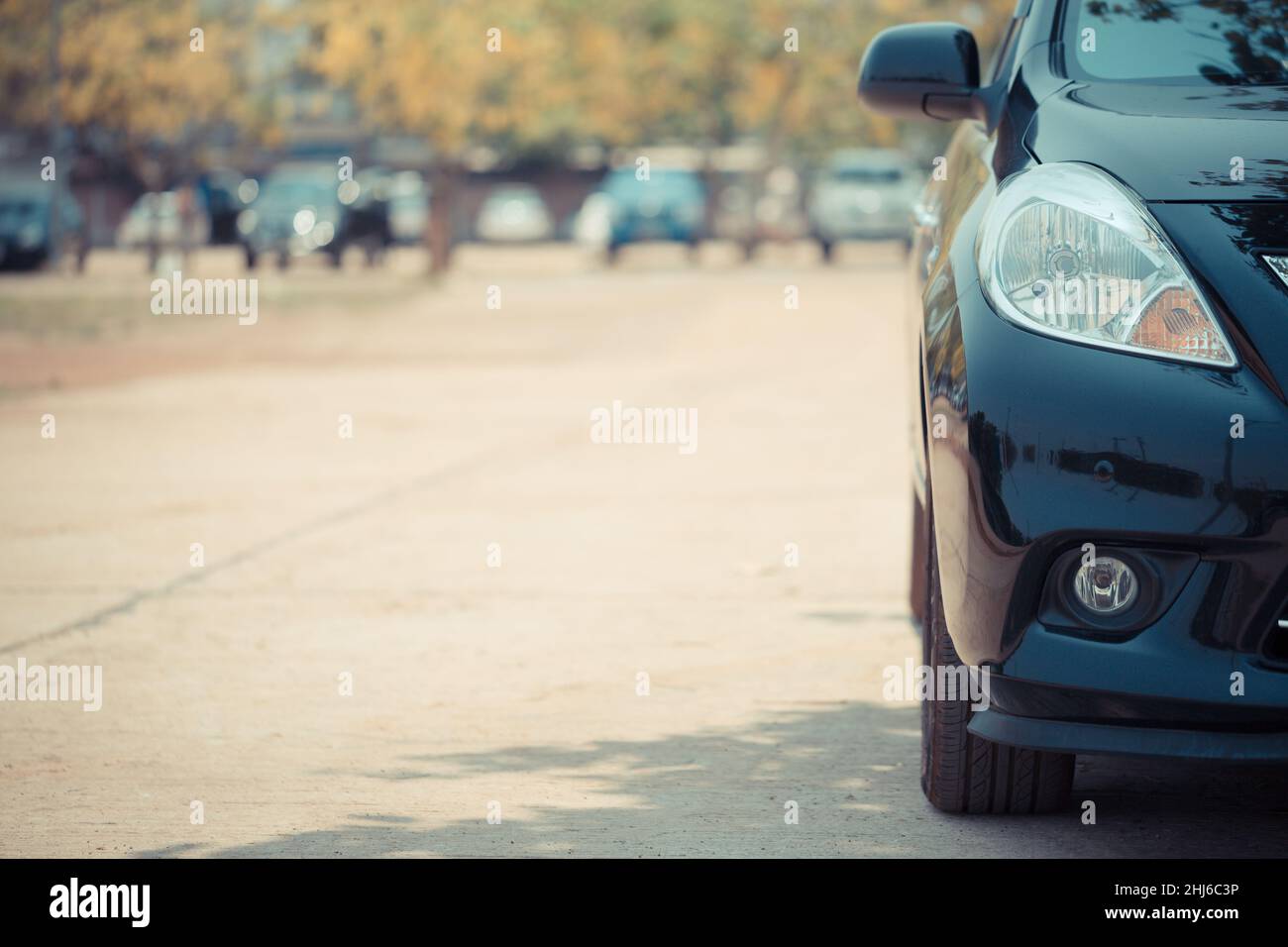 Half front view of black car park on the car park background Stock ...