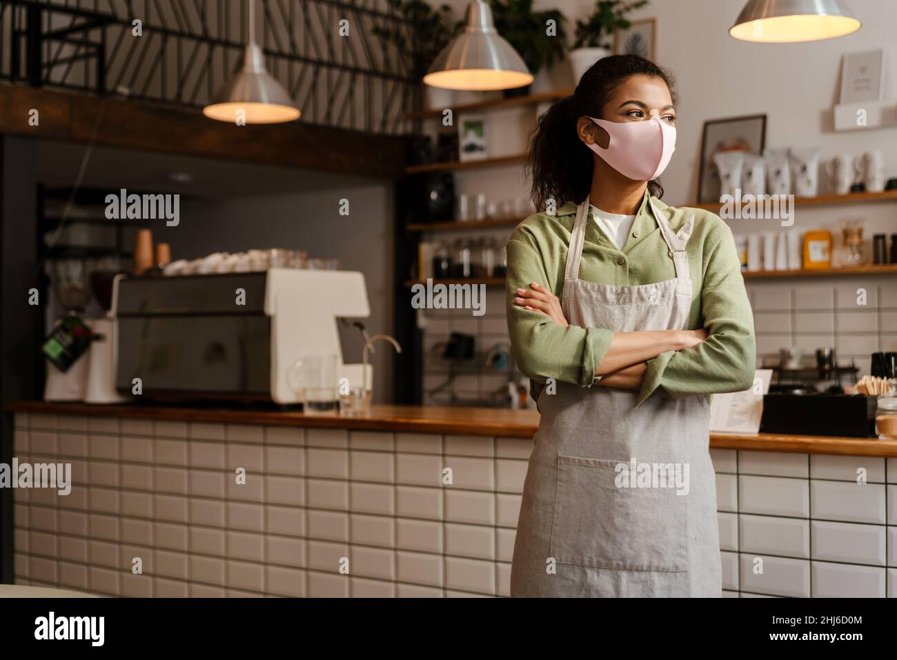 Young black waitress in hi-res stock photography and images - Alamy