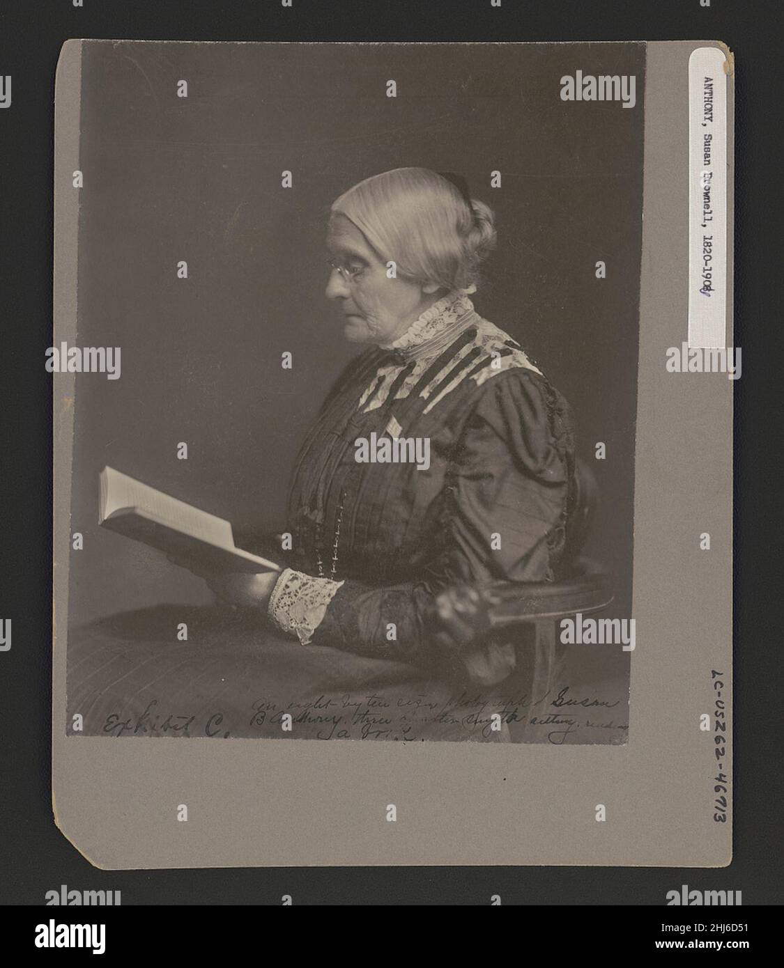 Susan B. Anthony sitting and reading a book Stock Photo - Alamy