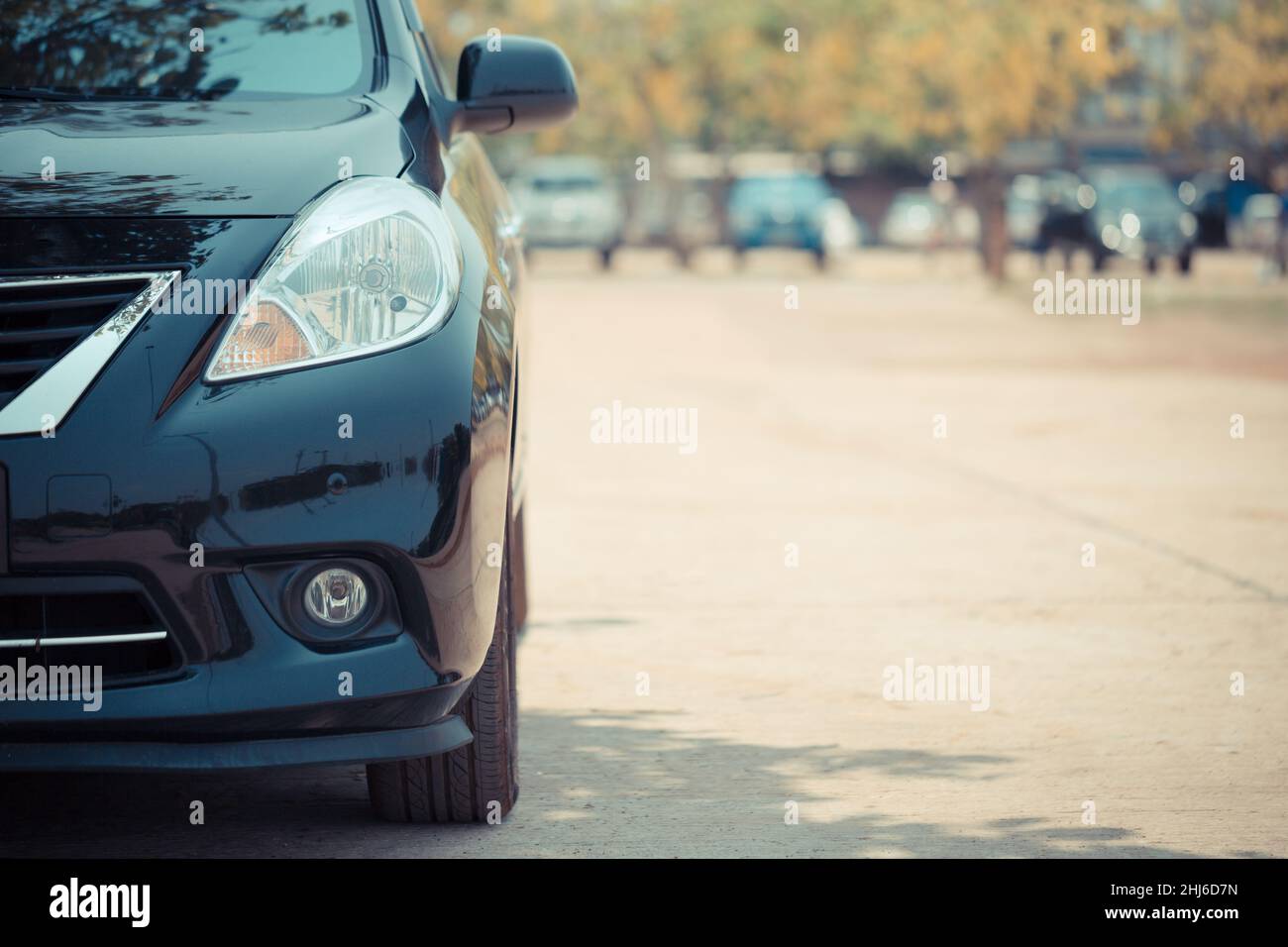 Half front view of black car park on the car park background Stock ...