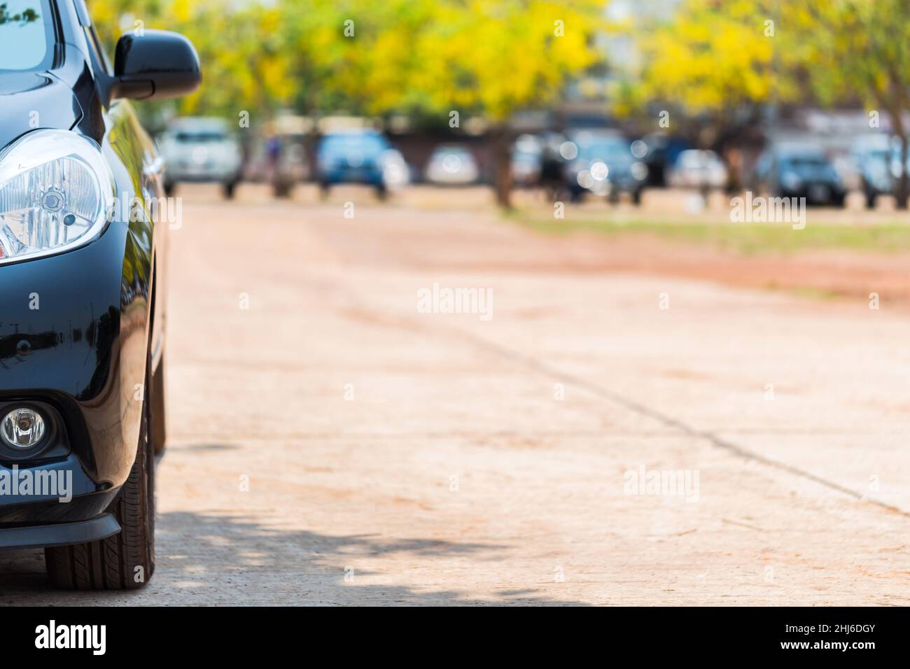Half front view of black car park on the car park background Stock ...