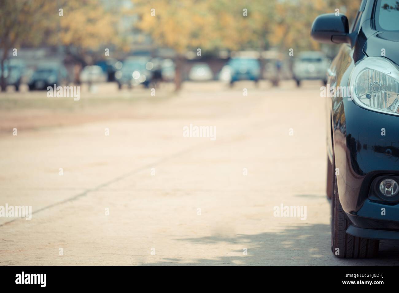 Half front view of black car park on the car park background Stock ...