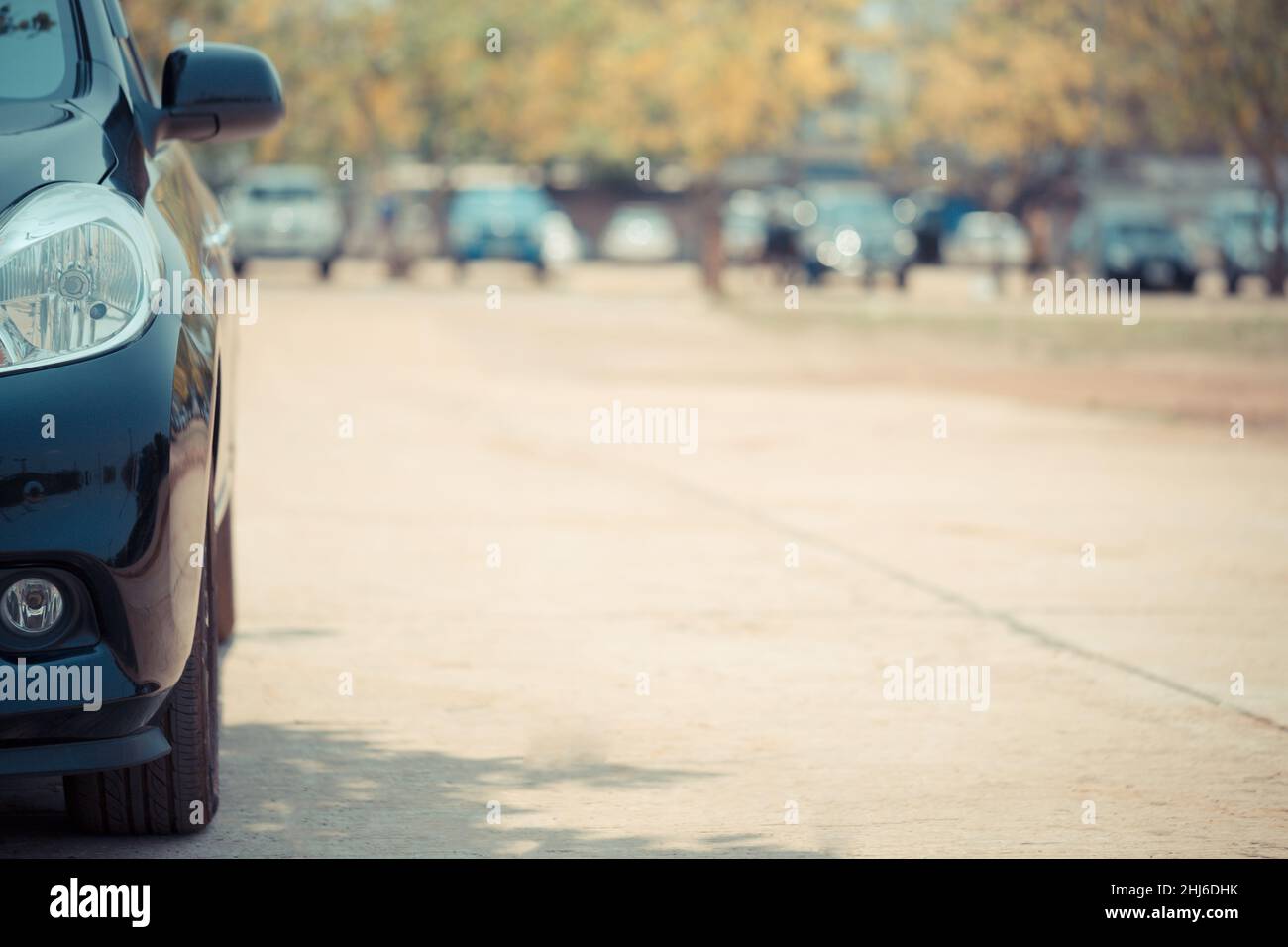 Half front view of black car park on the car park background Stock ...