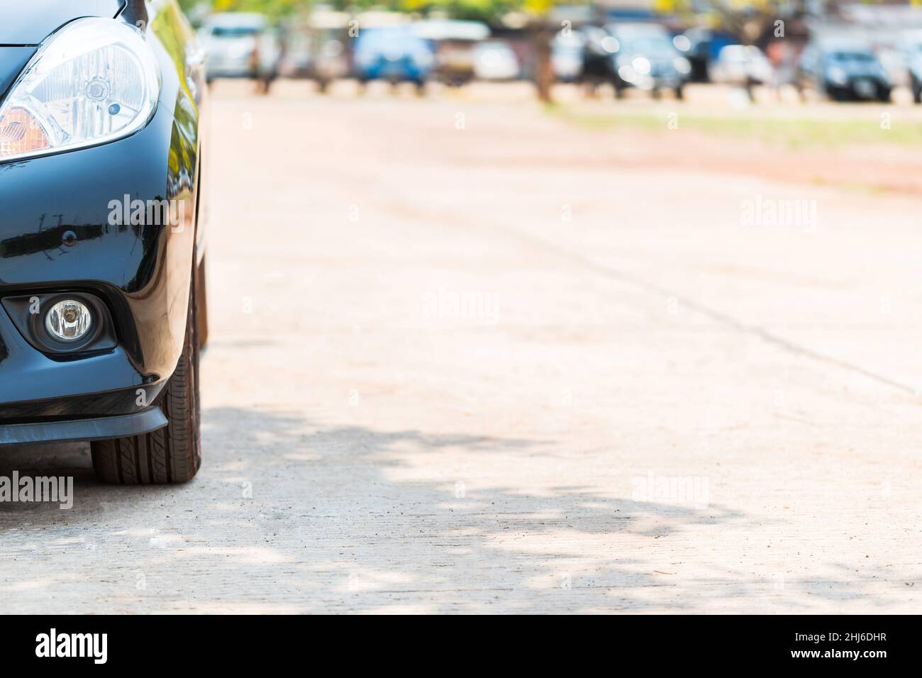 Half front view of black car park on the car park background Stock ...