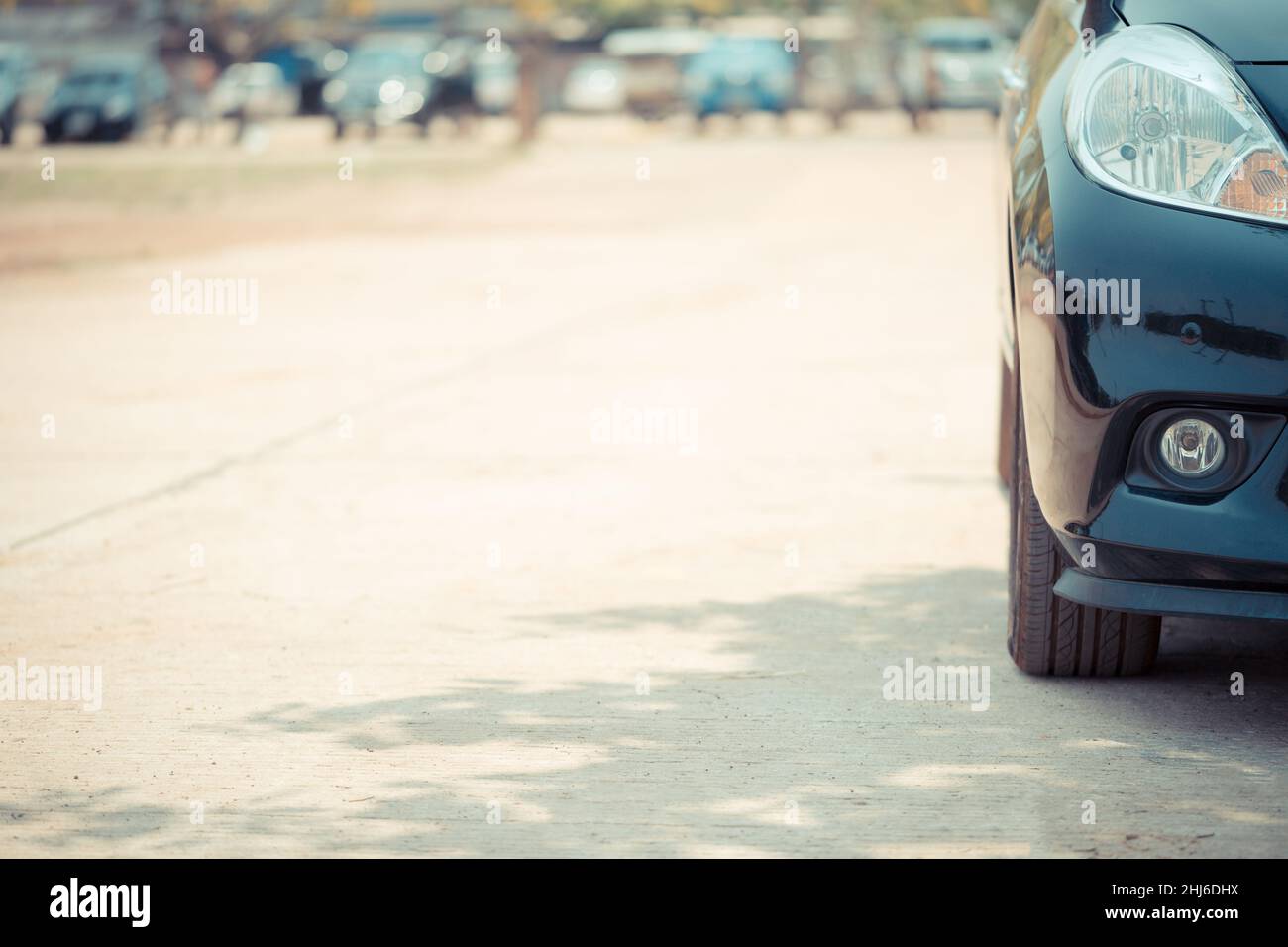 Half front view of black car park on the car park background Stock ...
