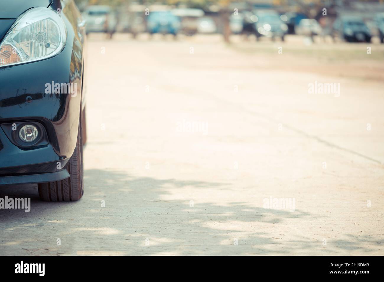 Half front view of black car park on the car park background Stock ...