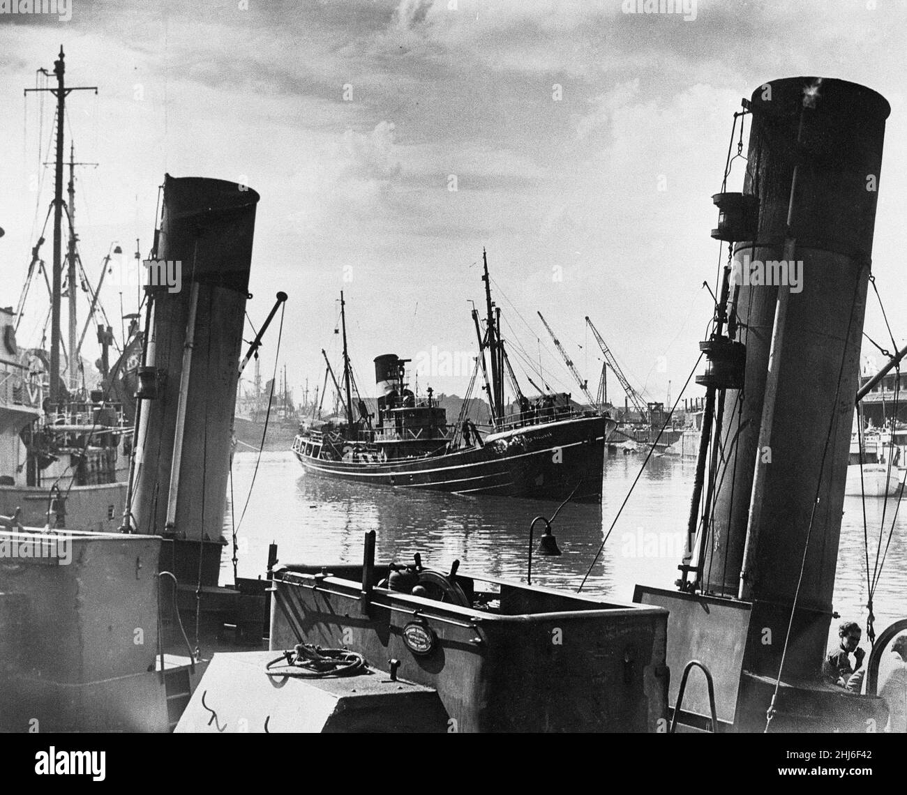 The trawler Cape Palliser seen here leaving a busy St Andrews Dock ...
